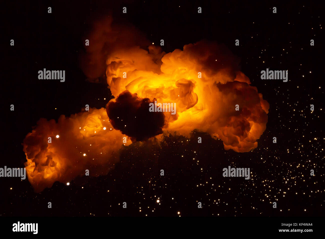 Realistic fiery explosion with sparks over a black background. Fireball ...