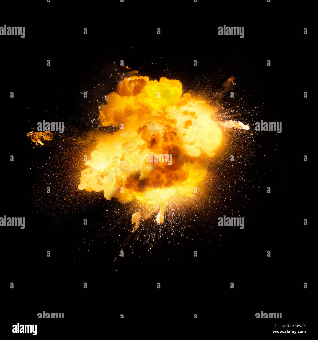 Realistic fiery explosion with sparks over a black background. Fireball ...