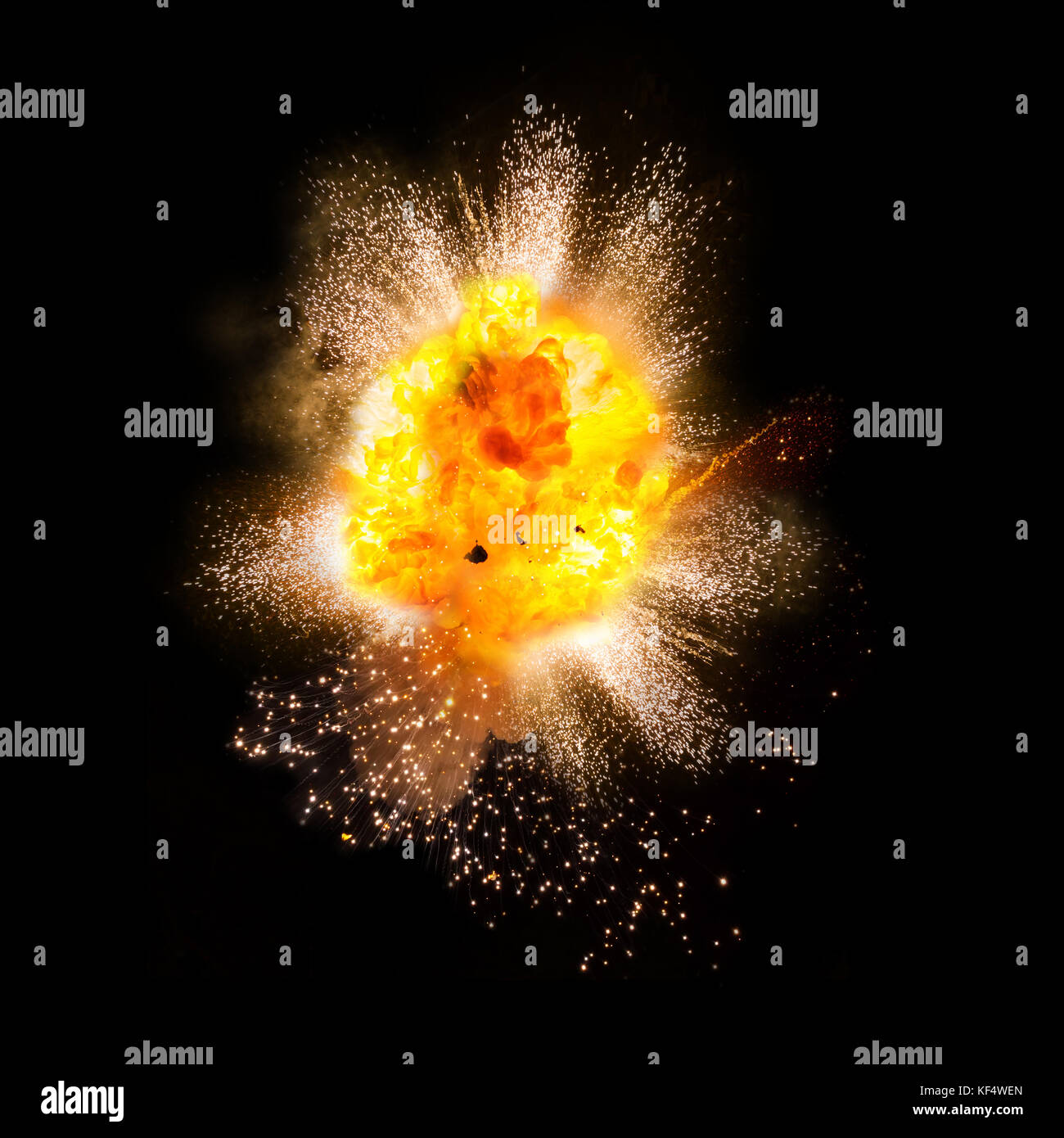 Realistic fiery explosion with sparks over a black background. Fireball ...