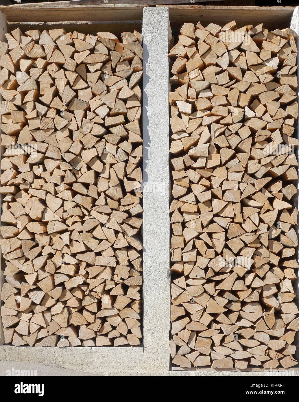 Neatly stacked firewood Stock Photo - Alamy