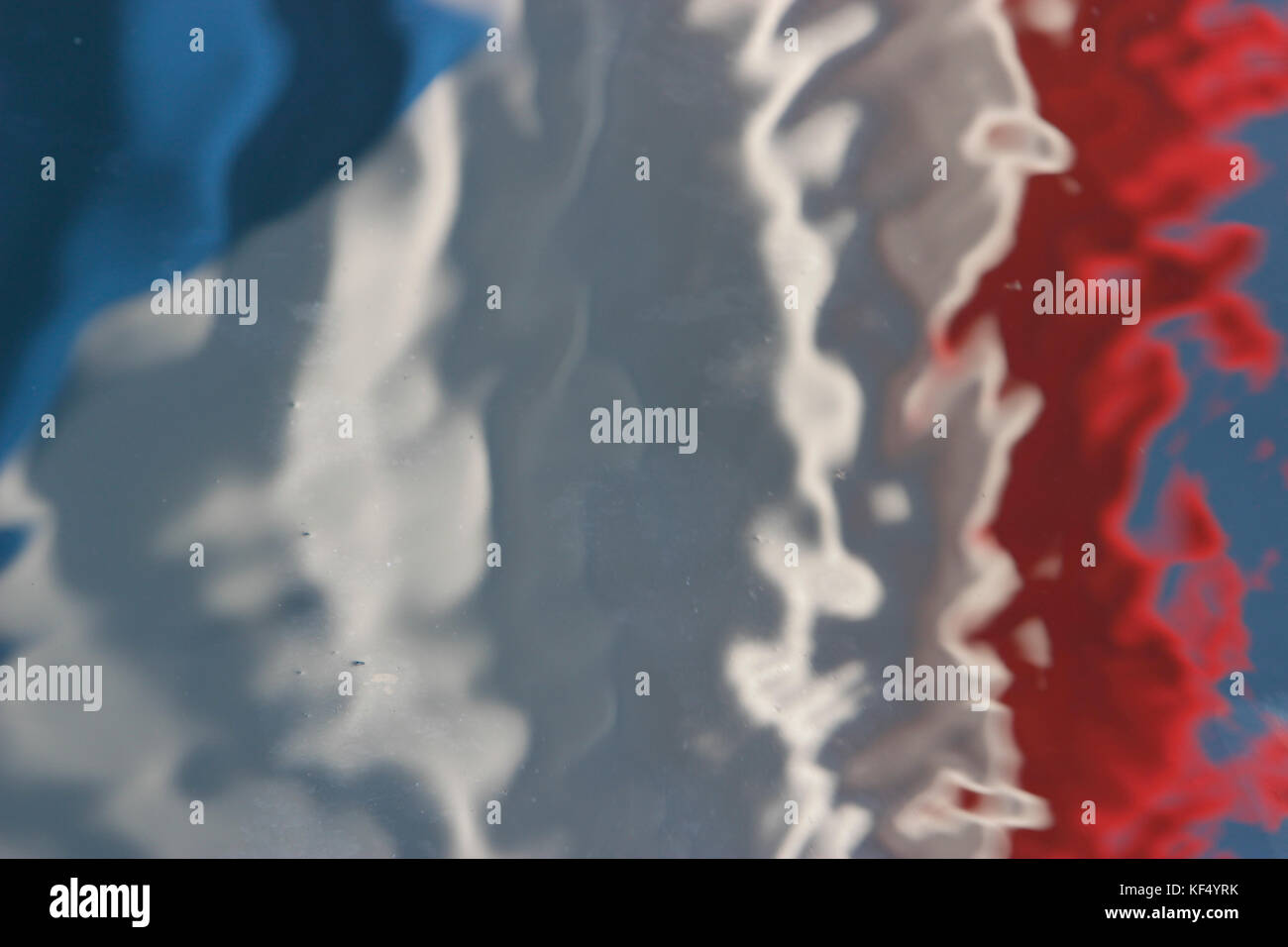 France, zoom on reflection of the french national flag in water Stock ...