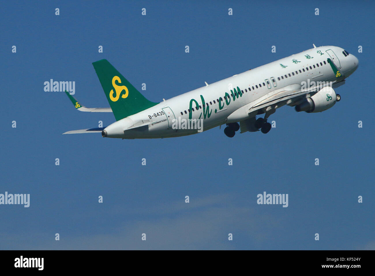 Aircraft Spring Airlines in the sky Stock Photo - Alamy