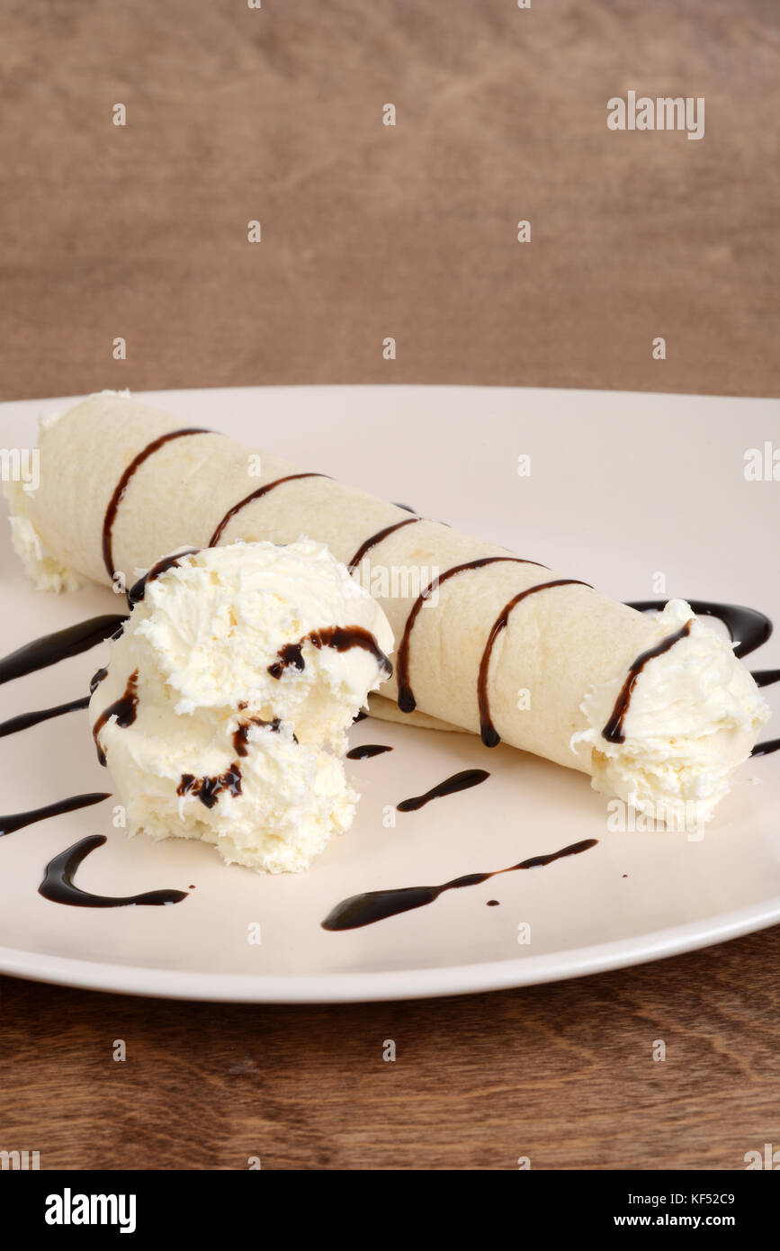 vanilla ice cream crepe with chocolate sauce Stock Photo - Alamy