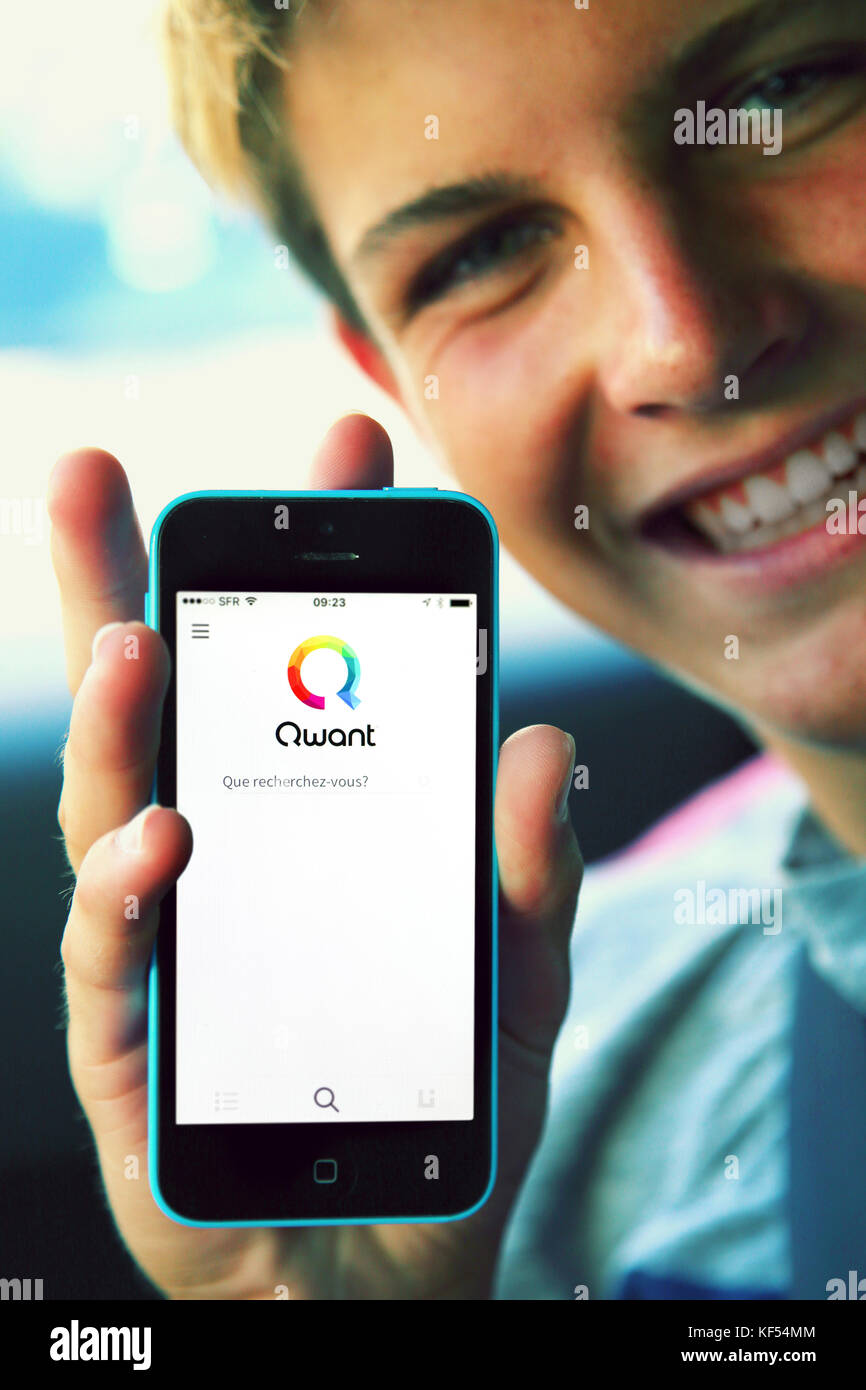 Teen using Qwant. French search engine Stock Photo - Alamy