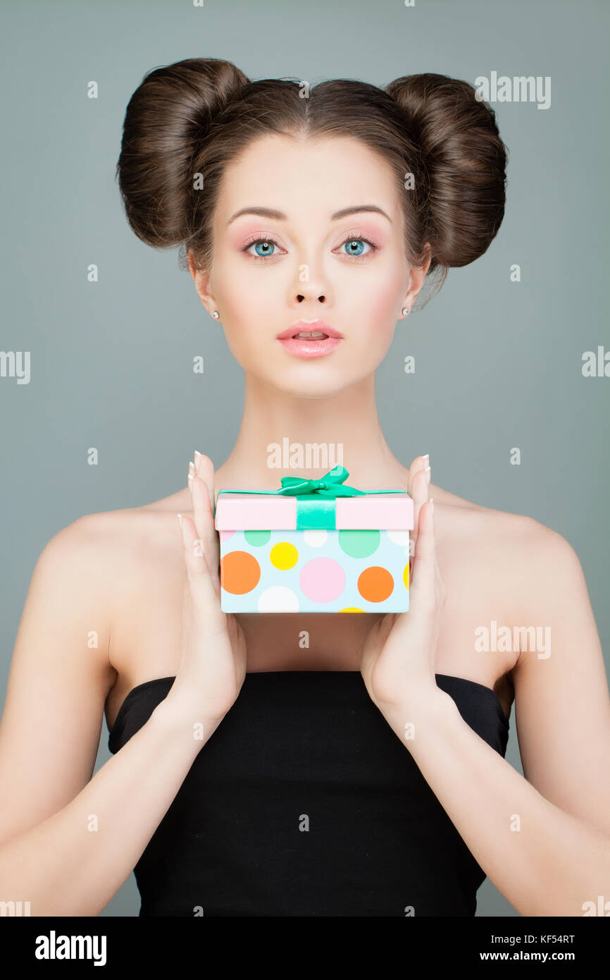Beautiful Model Woman with Gift Box Stock Photo - Alamy