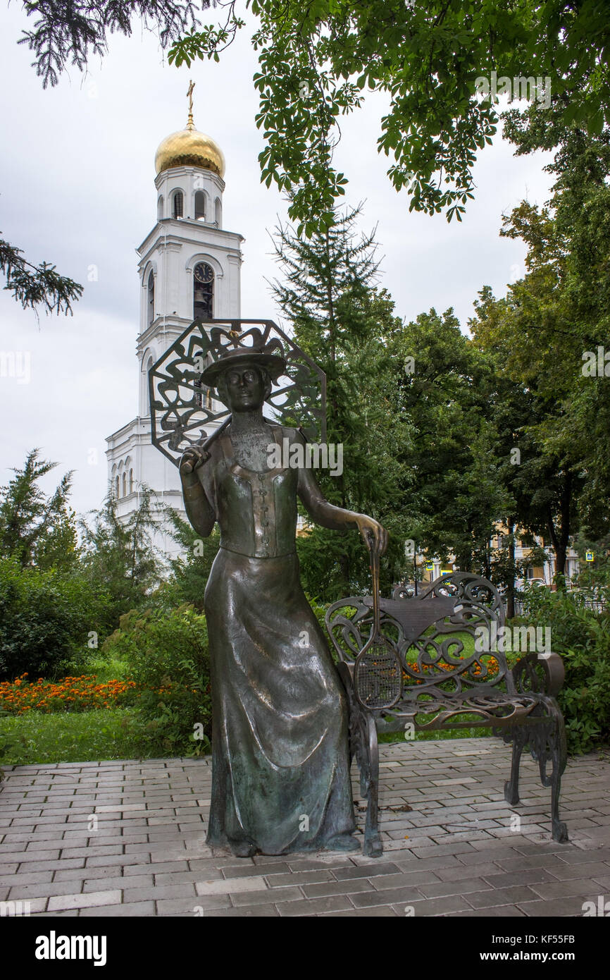 SAMARA, RUSSIA-JUN, 2017: Lady with tennis racket is near bench ...
