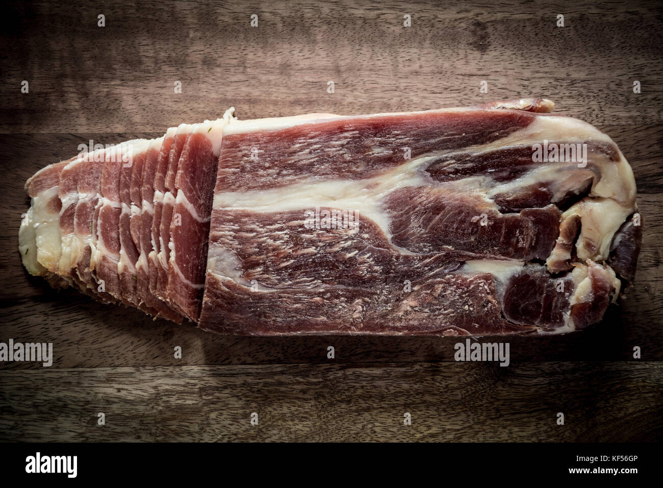 Sliced jamon on a wooden board Stock Photo - Alamy