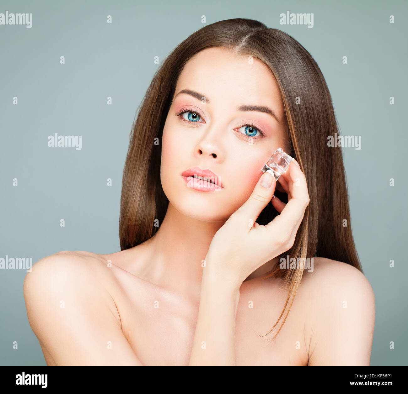 Spa Model Woman with Healthy Skin holding Ice Cubes. Young Perfect ...