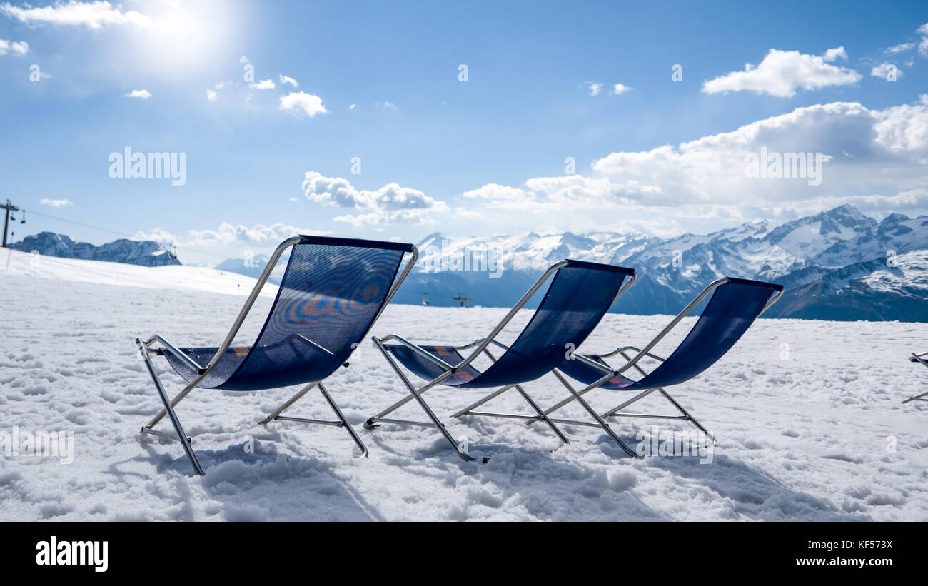 Snow and sun in the mountain ski resort Stock Photo - Alamy