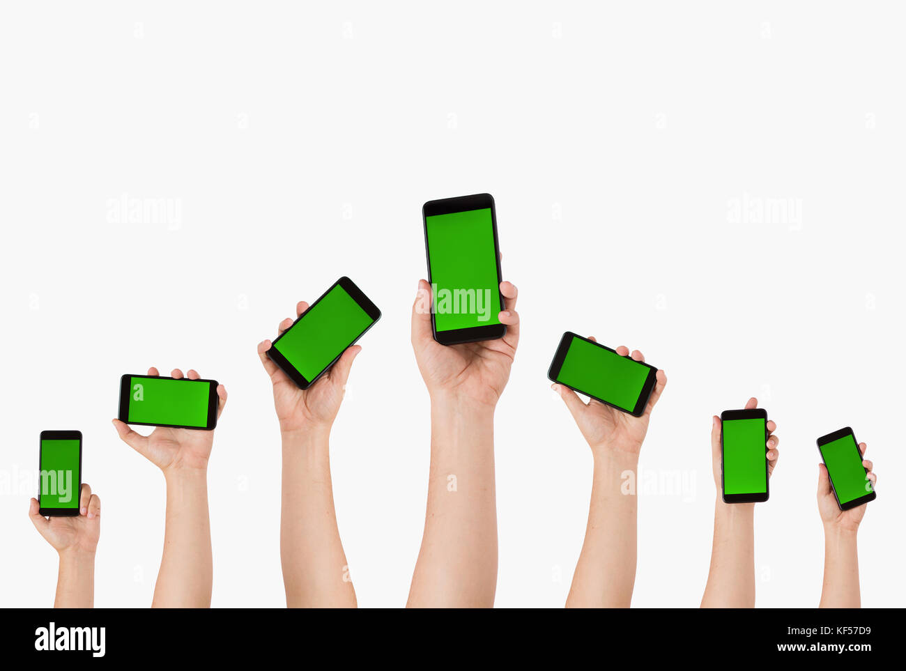 group of hands holding phones Stock Photo - Alamy
