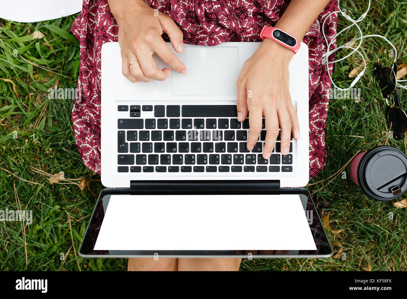 Crop top view of woman using laptop Stock Photo - Alamy