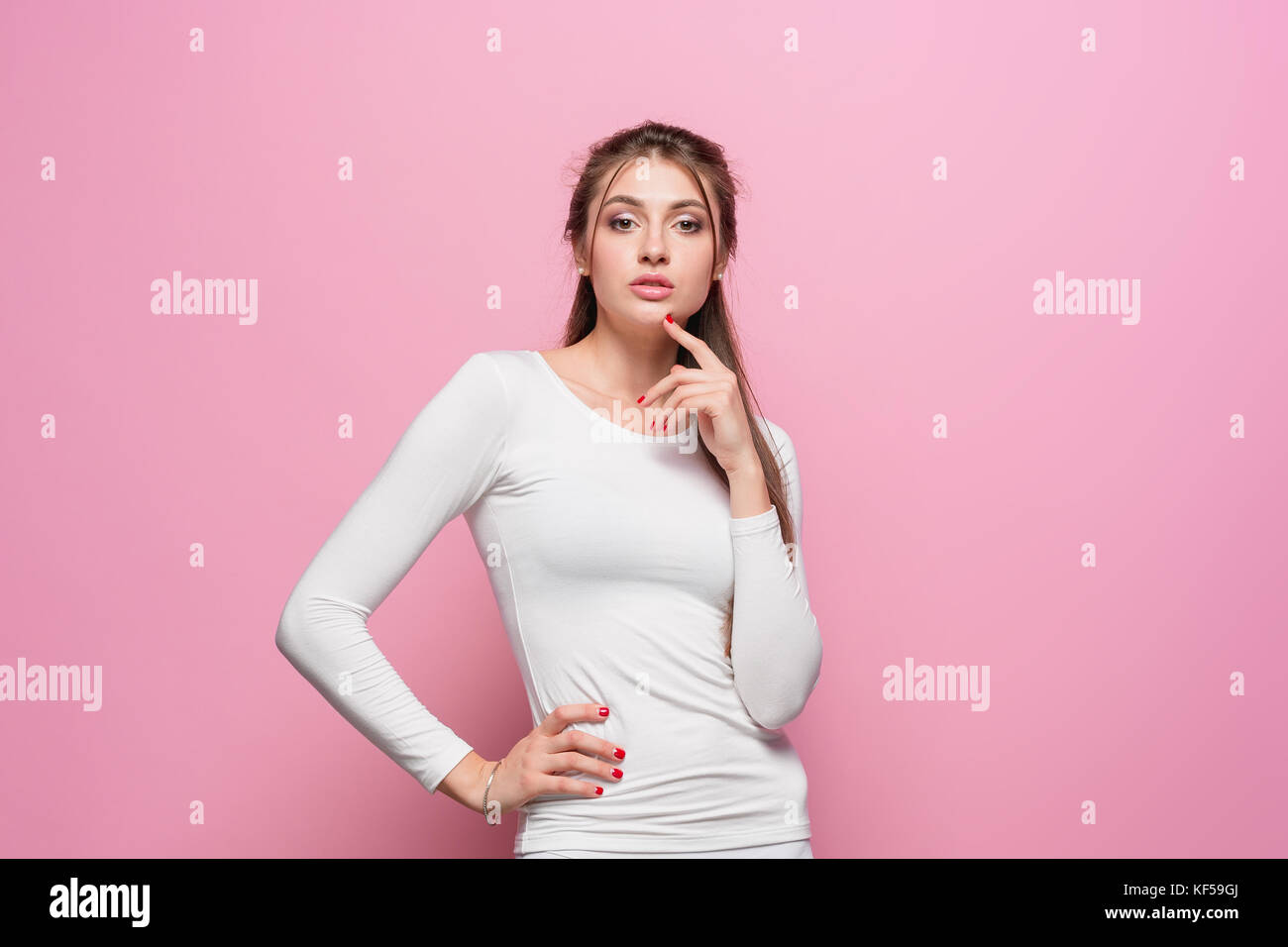 The young woman's portrait with proud and arrogant emotions Stock Photo ...