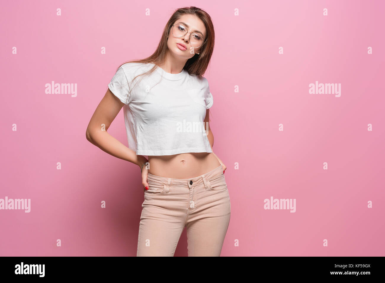 The young woman's portrait with proud and arrogant emotions Stock Photo ...