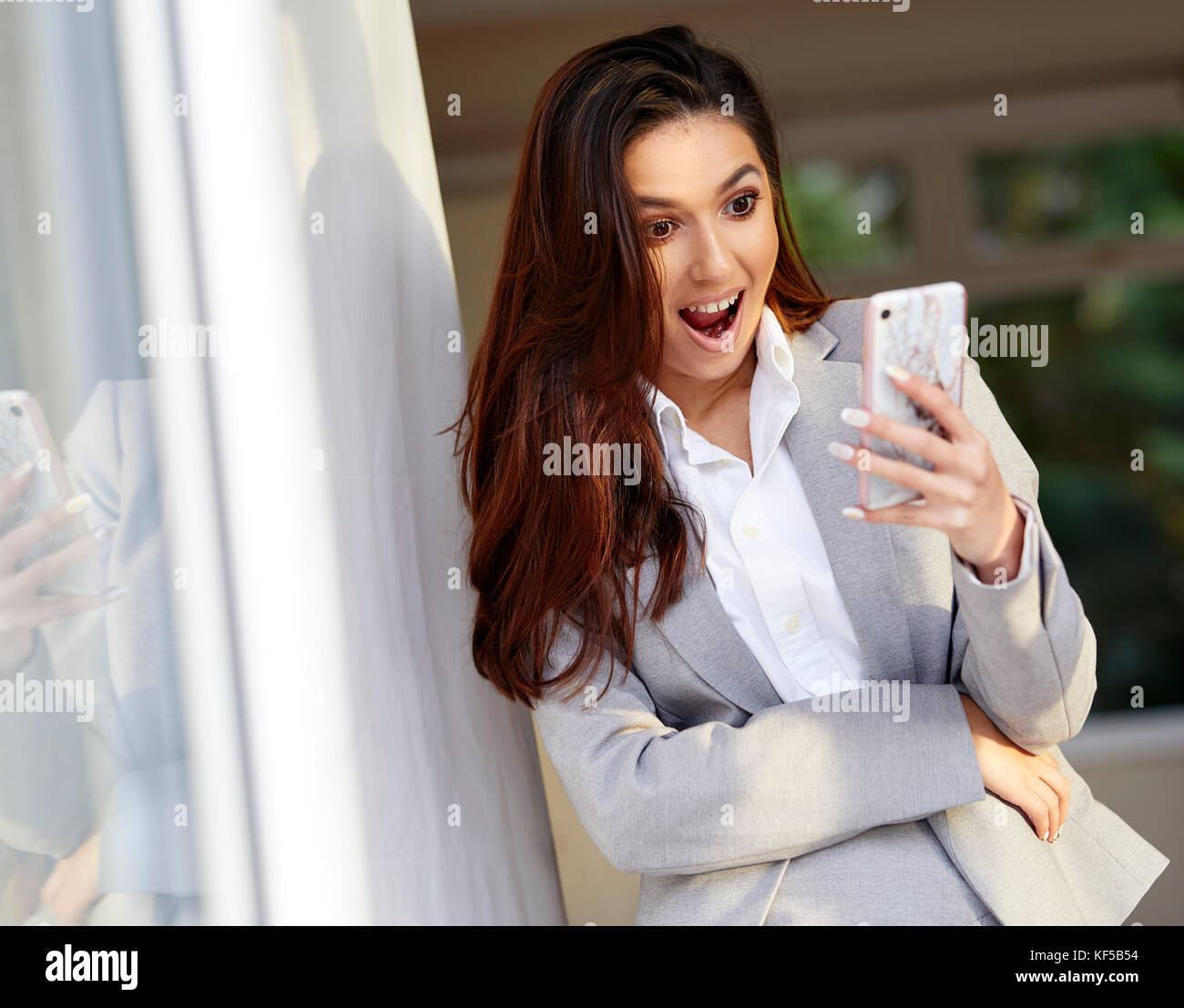 Mobile communication reading workplace hi-res stock photography and ...