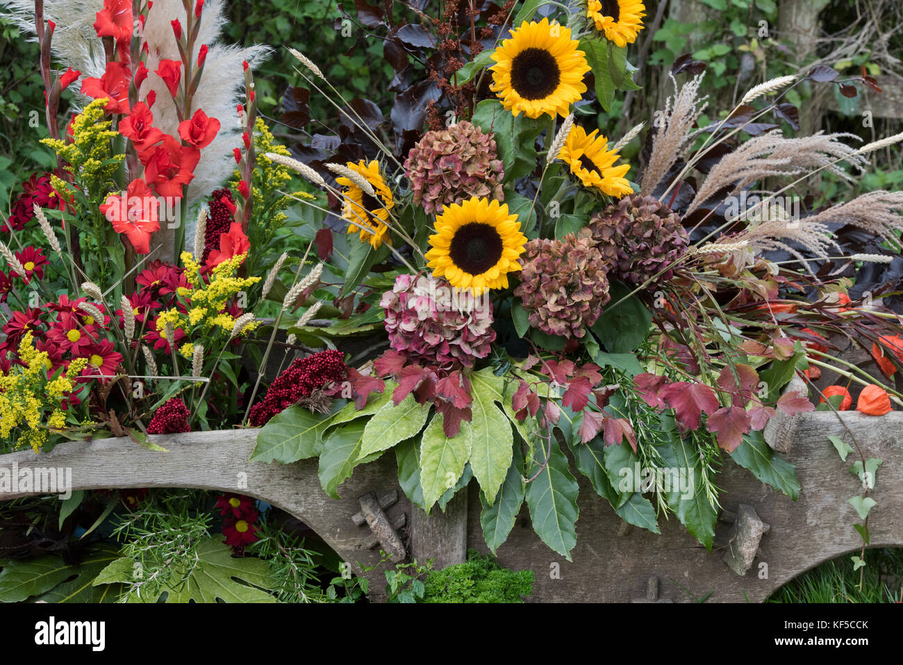 Autumnal rustic harvest festiva flower display at Weald and Downland ...