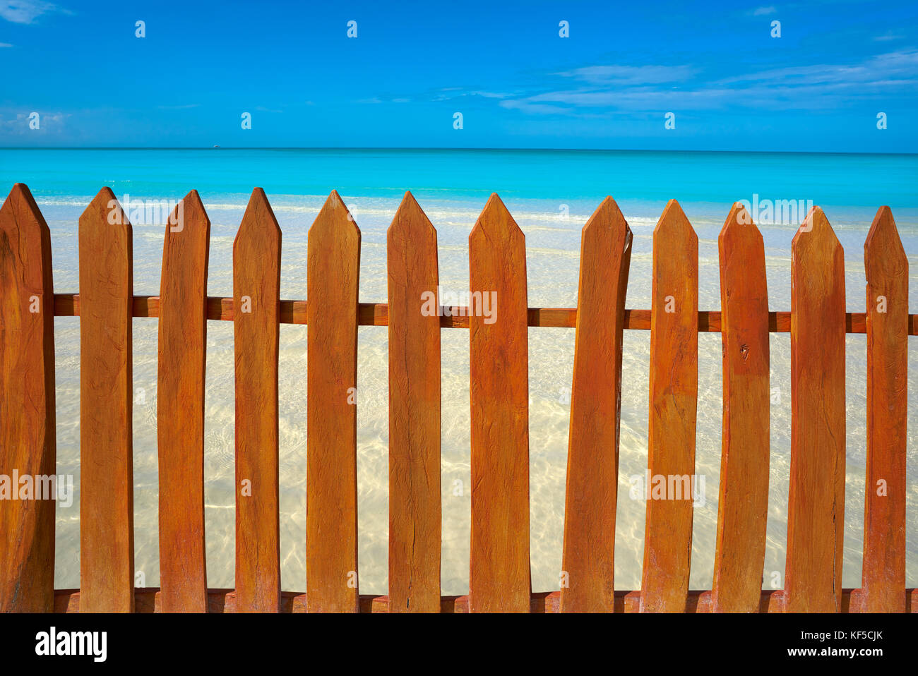 Caribbean island wooden fence in turquoise beach Stock Photo - Alamy