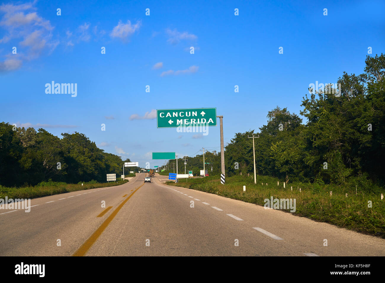 Merida Cancun road sign in Mexico Riviera Maya Stock Photo - Alamy