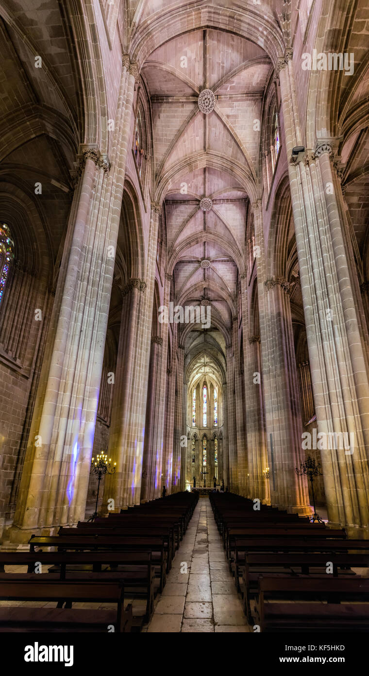 Interior of the Batalha Monastery, a prime example of Portuguese Gothic ...