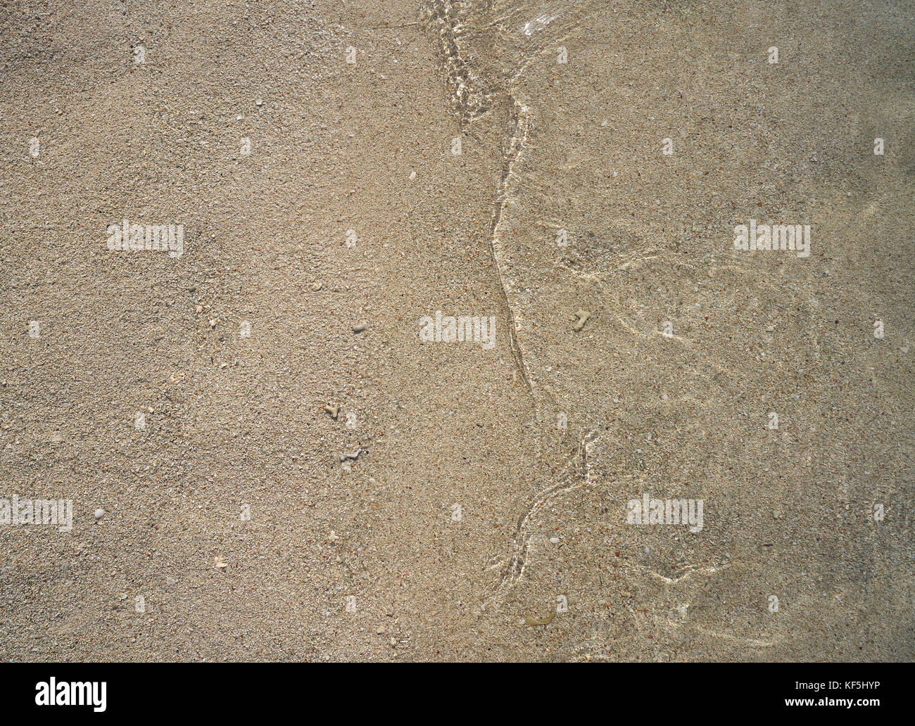 Caribbean beach sand shore detail clean waters Stock Photo - Alamy