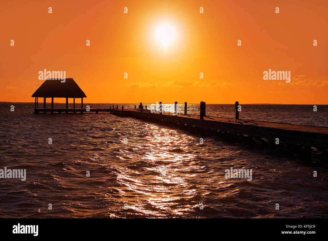 Holbox island sunset beach tropical hut pier in Mexico Stock Photo - Alamy