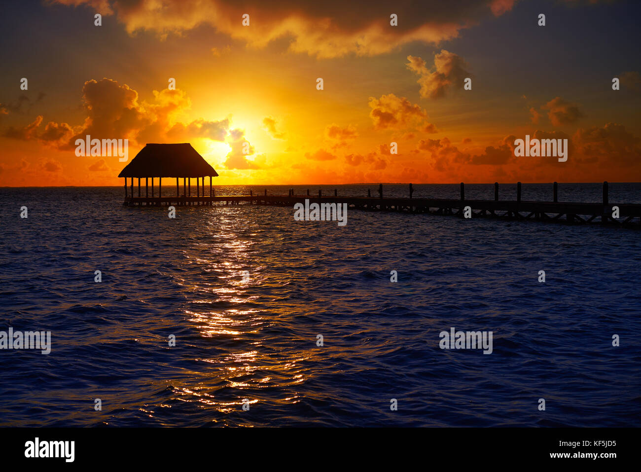 Holbox island sunset beach tropical hut pier in Mexico Stock Photo - Alamy