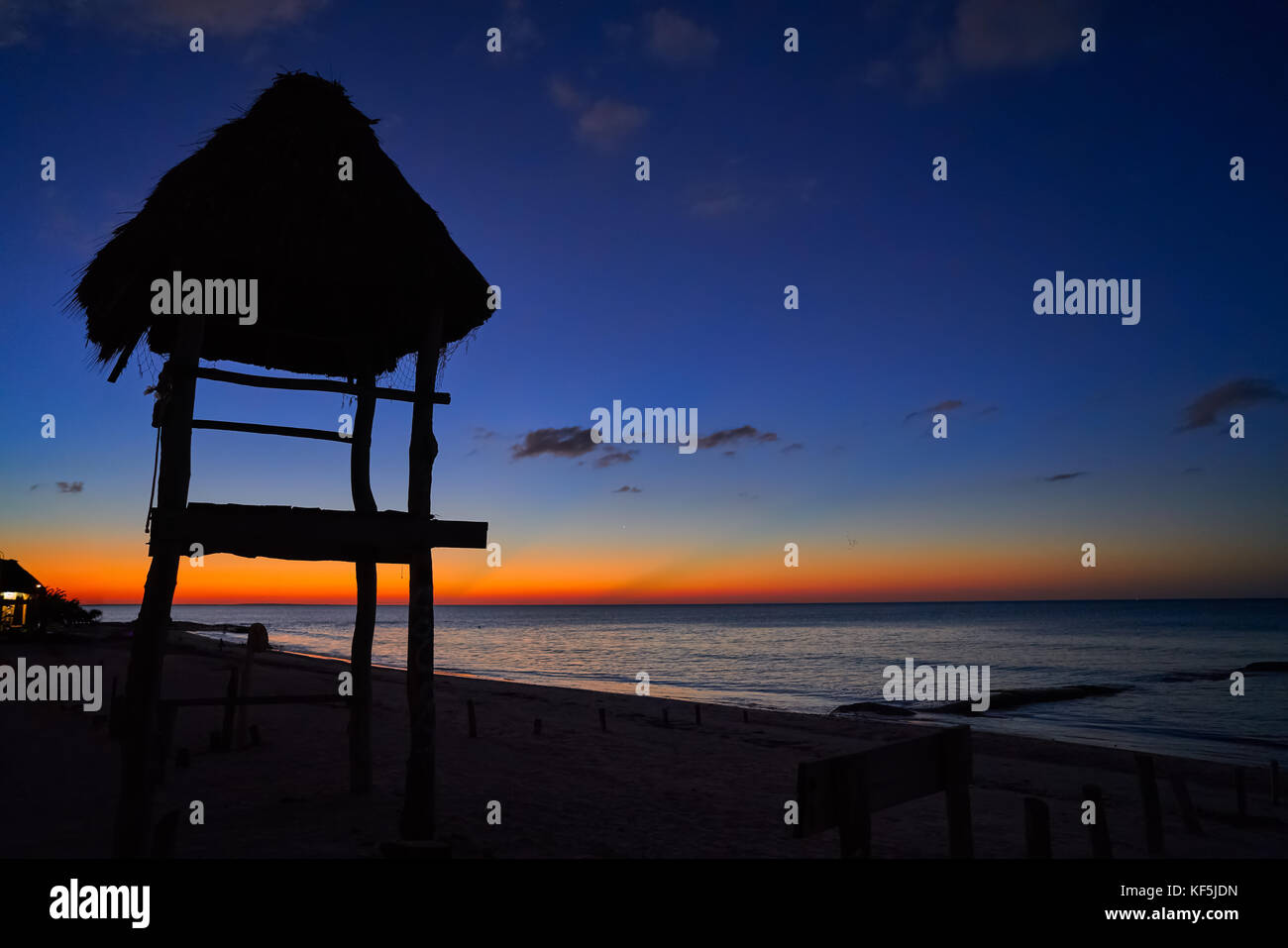 Holbox island sunset beach tropical hut in Mexico Stock Photo - Alamy