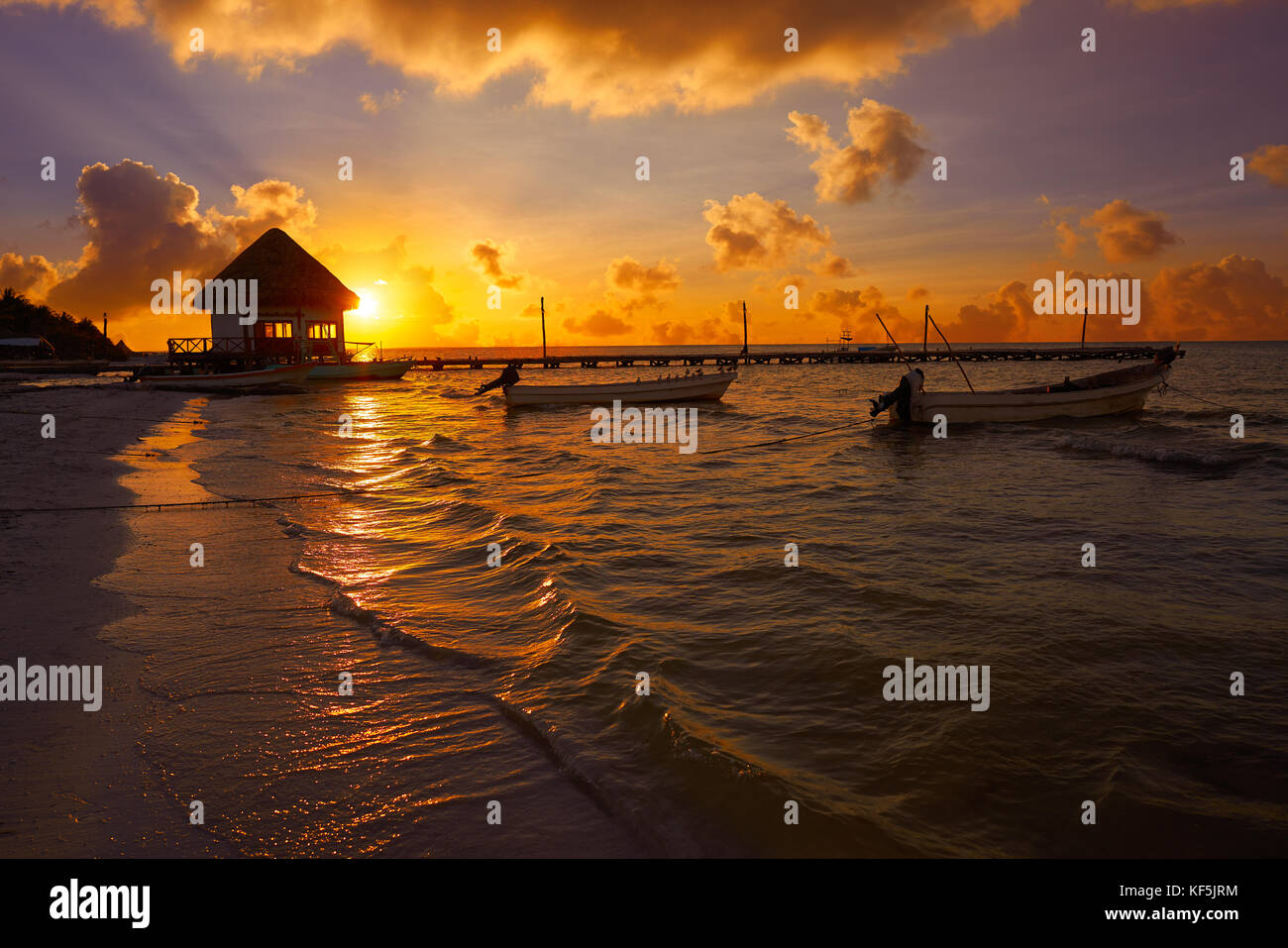 Holbox Island pier palapa sunset beach in Mexico Quintana roo Stock ...