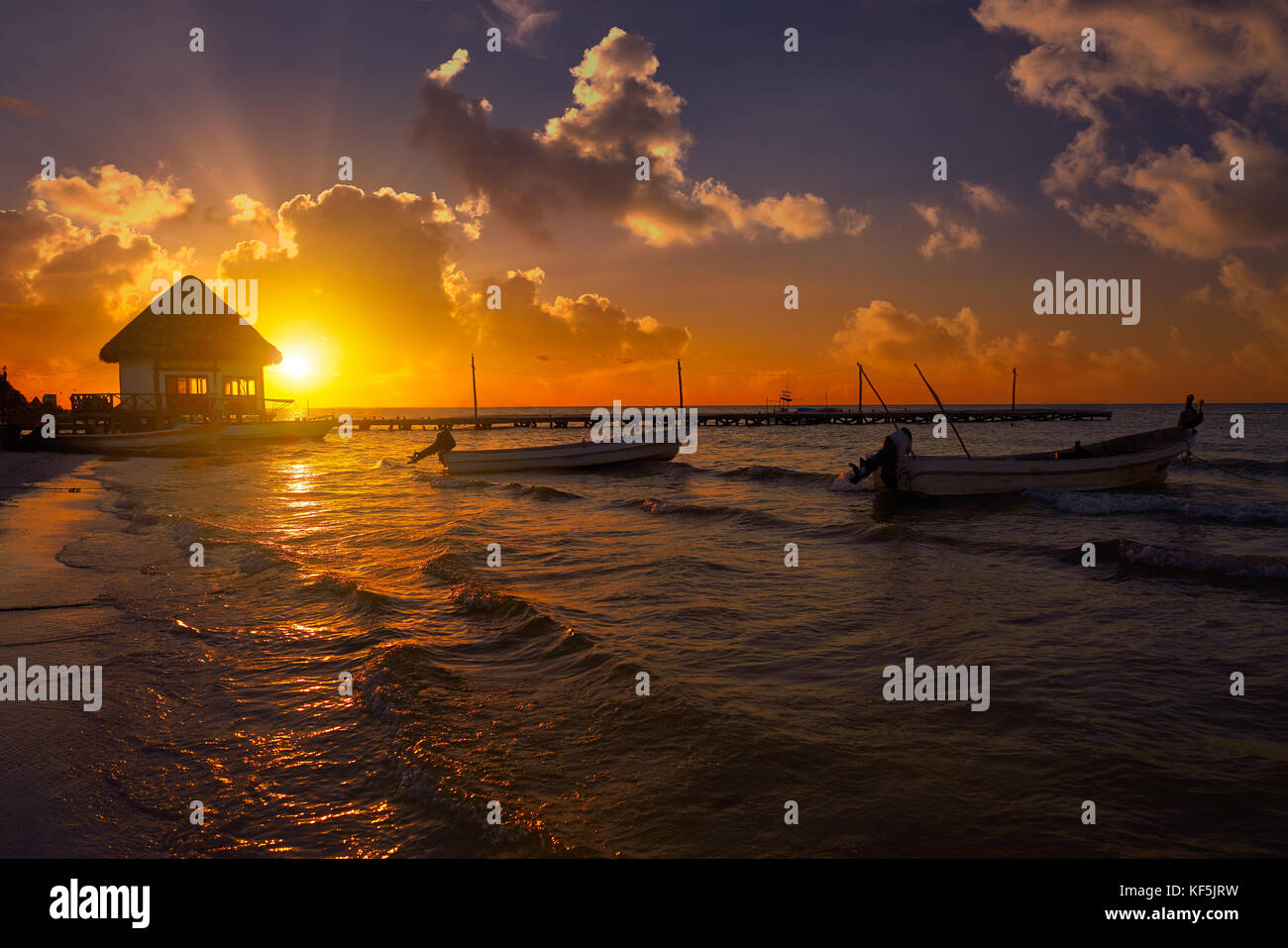 Holbox Island pier palapa sunset beach in Mexico Quintana roo Stock ...