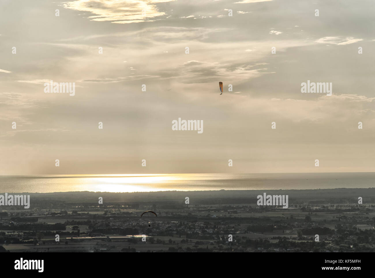 View of two paragliders in front of the sea Stock Photo - Alamy
