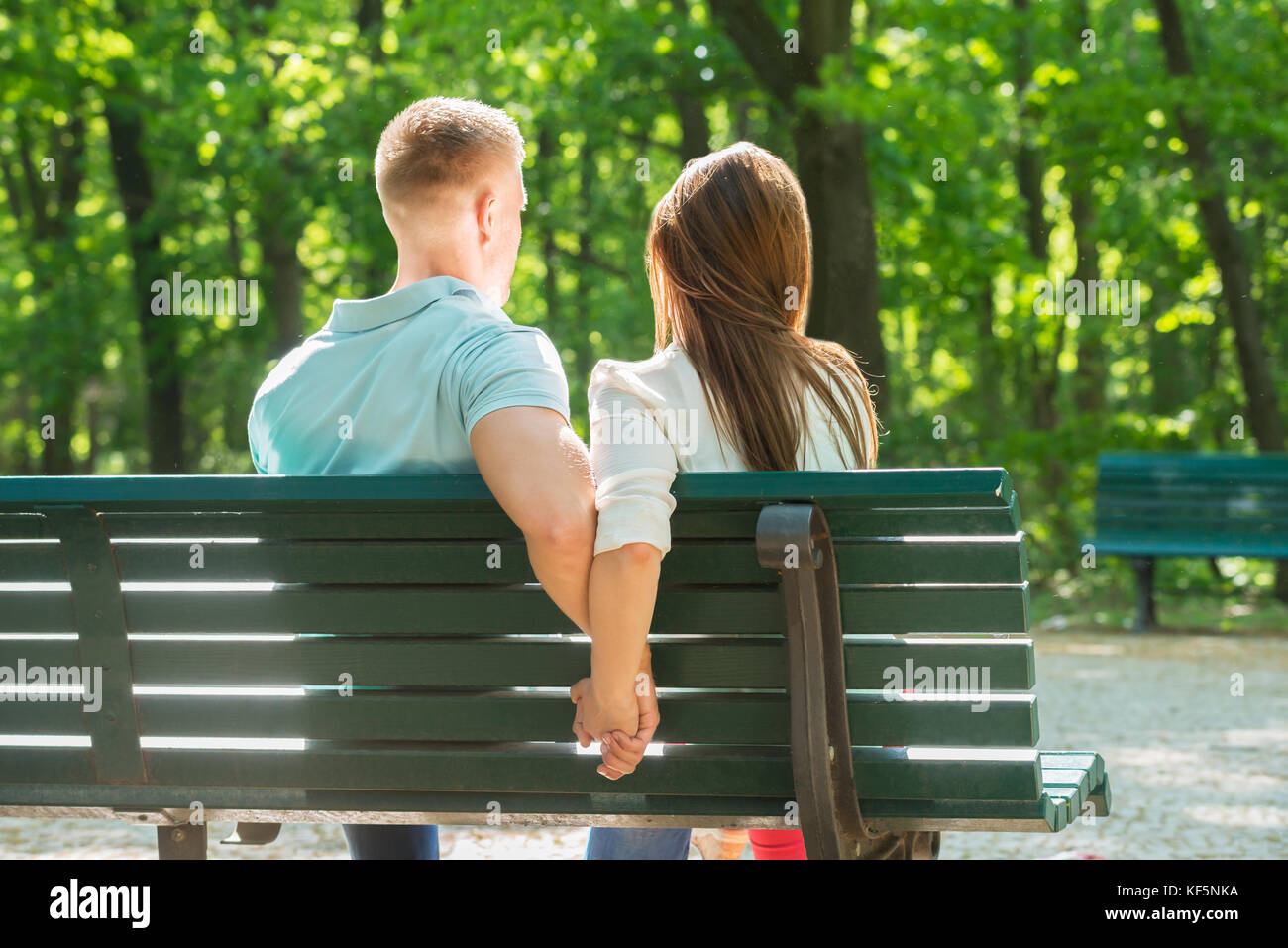 Young woman sitting picnic bench hi-res stock photography and images ...