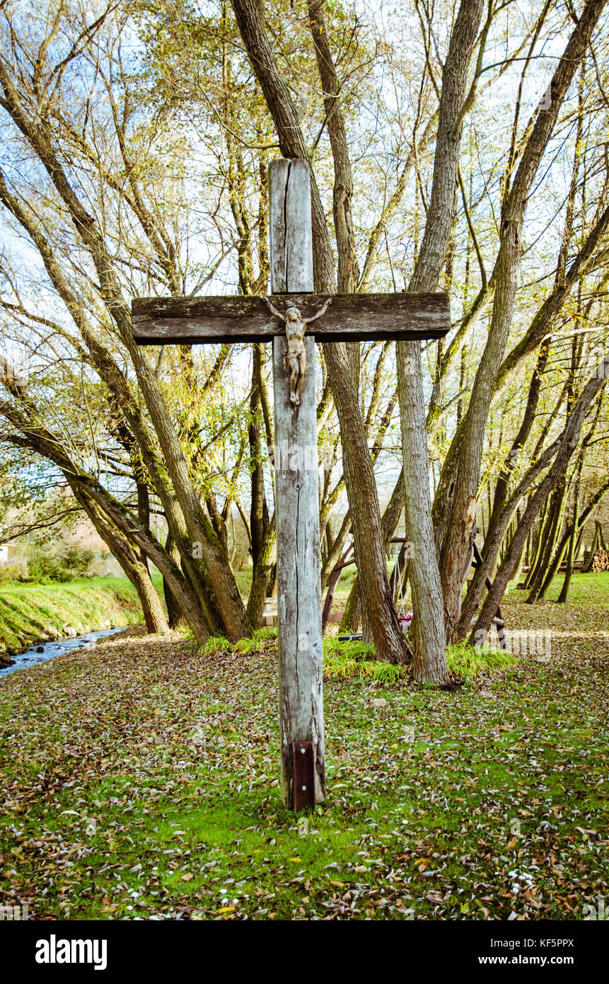 wooden cross symbol in the nature Stock Photo - Alamy