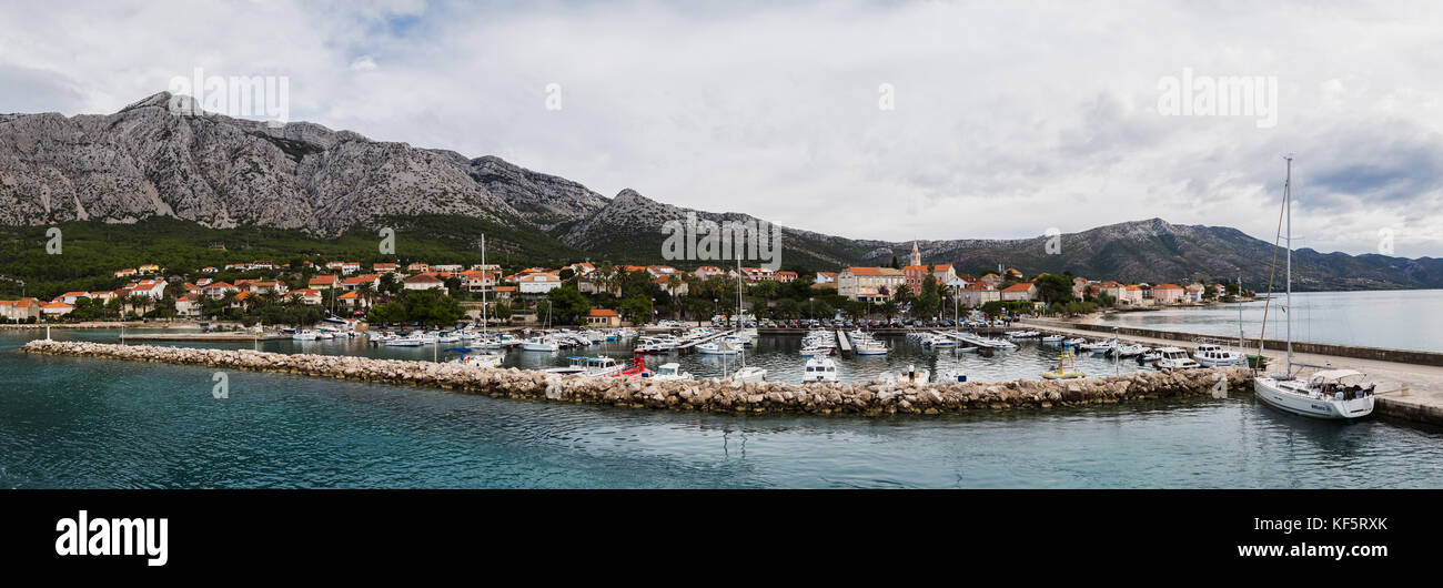 A multiple image panorama of Orebic marina seen from the top of a car ...