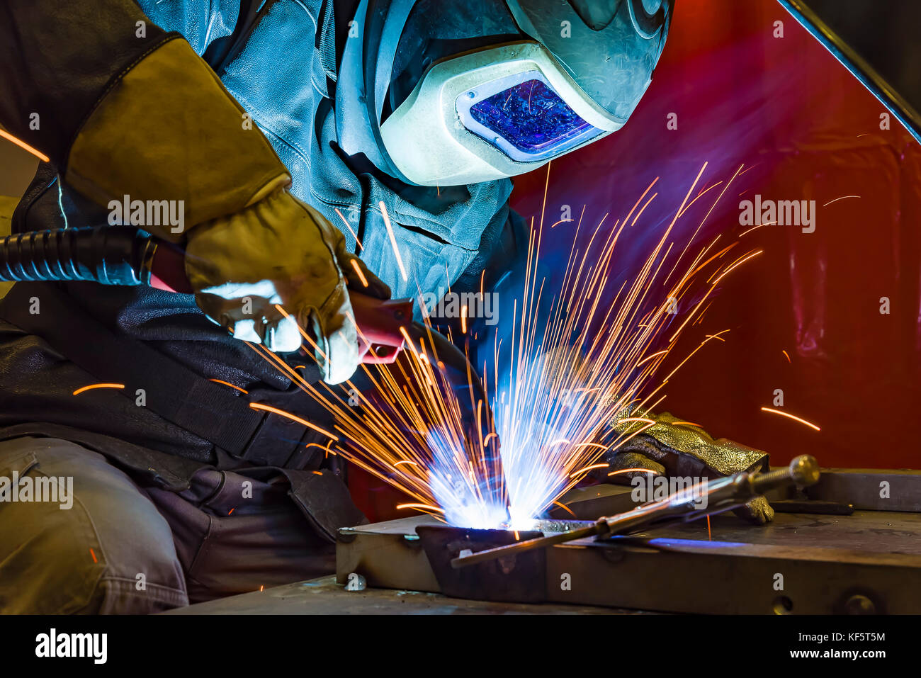 welder, craftsman, erecting technical steel Industrial steel welder in ...