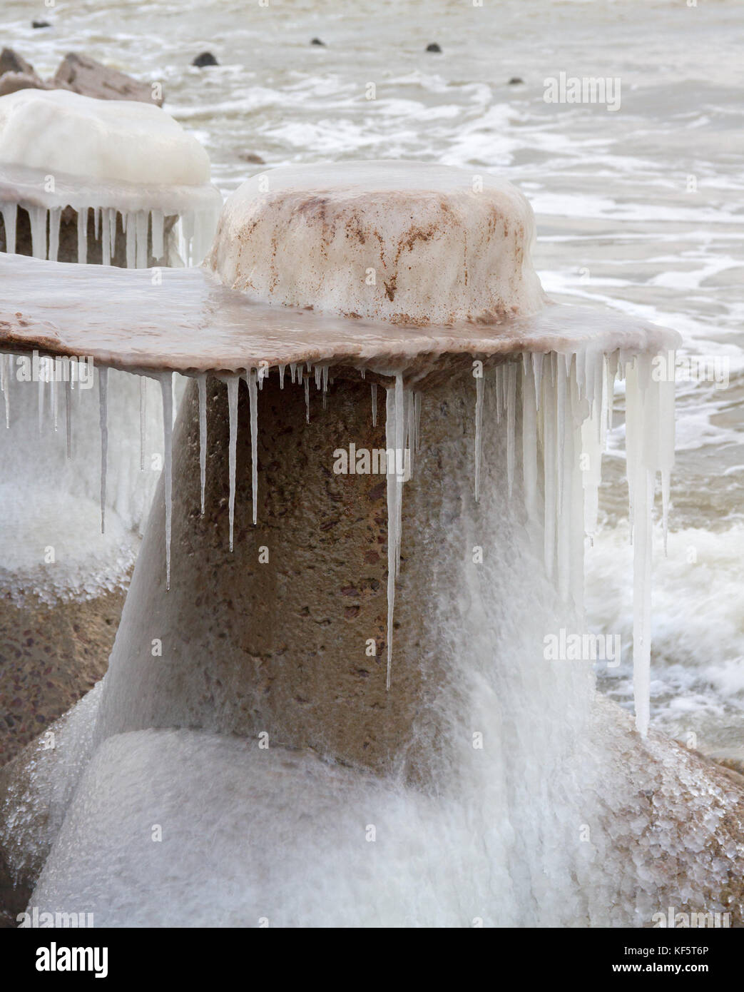 Stone of breakwater in a winter time Stock Photo - Alamy
