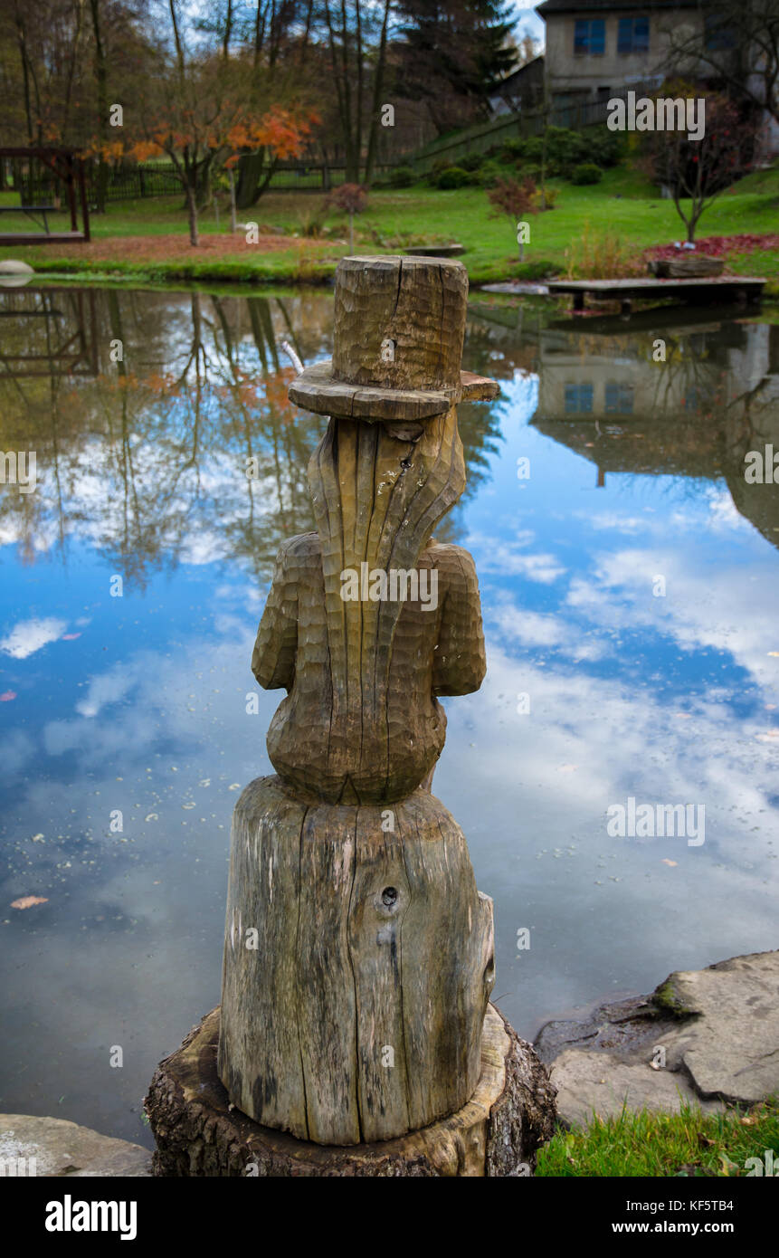 water-sprite statue by the autumn pond Stock Photo - Alamy