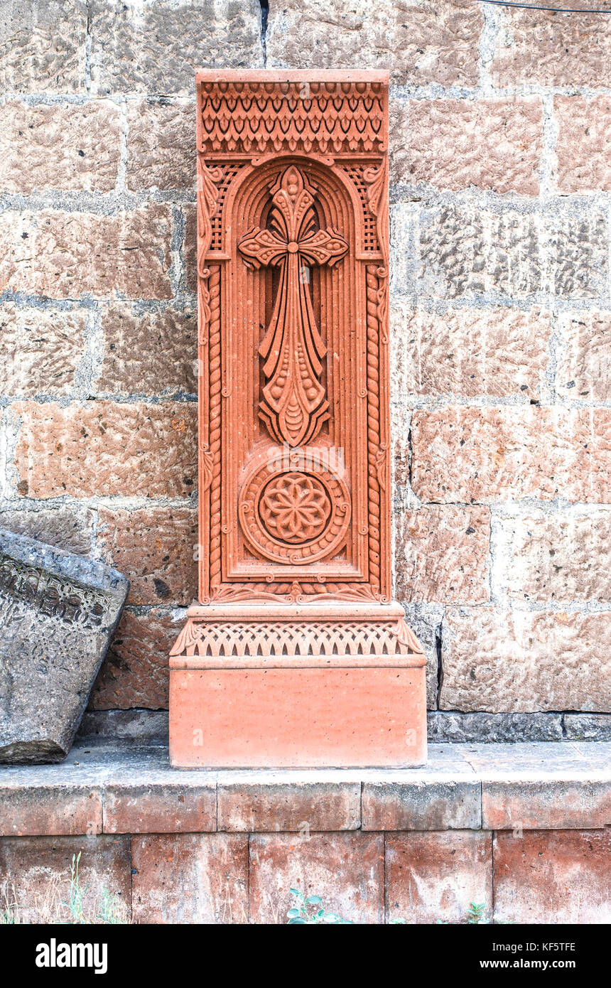 Stone cross made of red tuff at the Church of the Martyr St. Hripsime ...