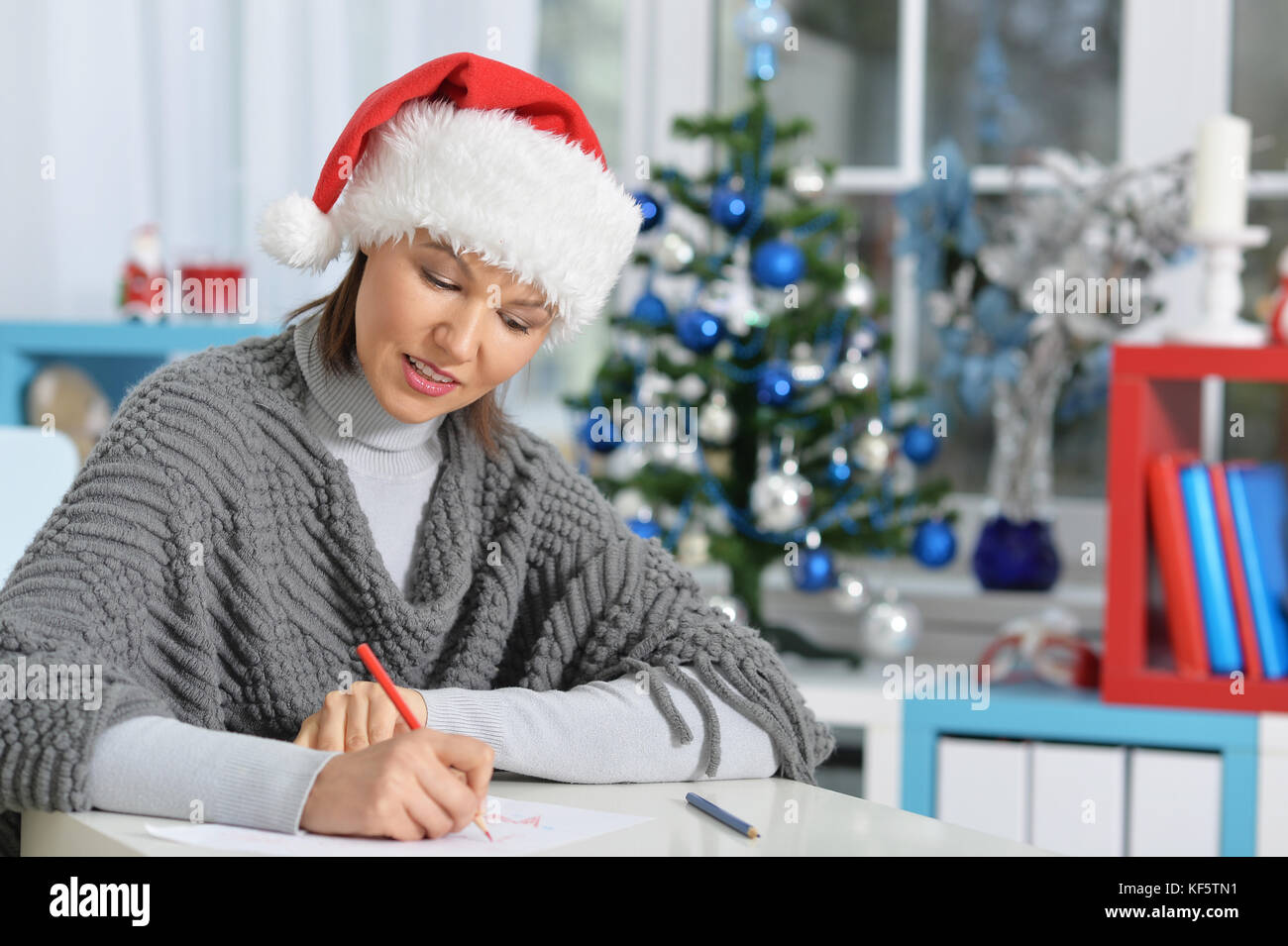Girl writing letter Stock Photo - Alamy