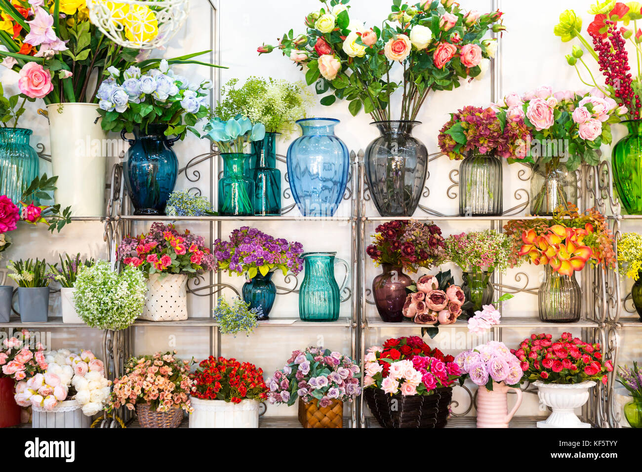 Flower shop, bouquets on shelf, florist business Stock Photo - Alamy