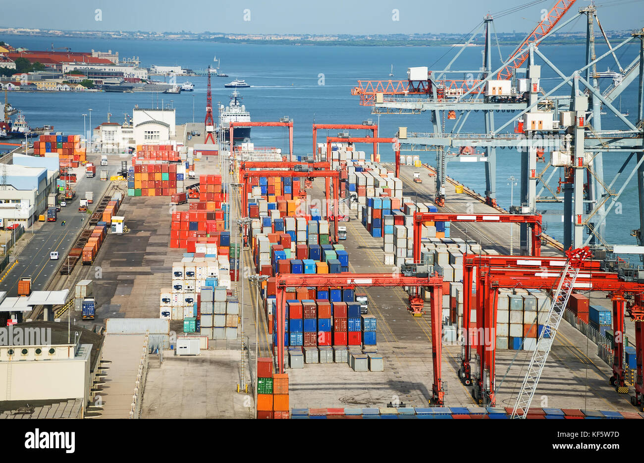 Industrial sea port with containers and cranes Stock Photo - Alamy