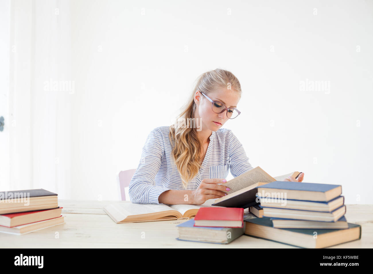 Student woman many books preparing hi-res stock photography and images ...
