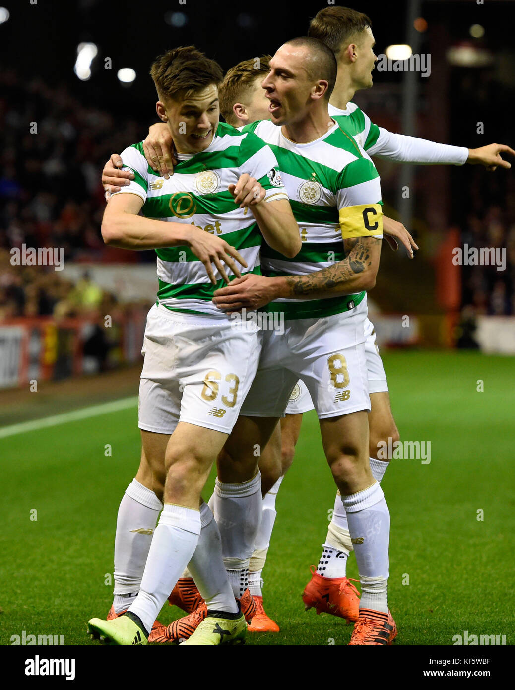 Celtic's Kieran Tierney celebrates with captain Scott Brown after ...