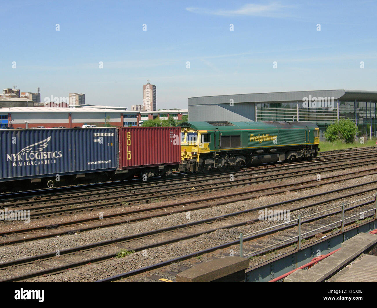 Class 66 locomotive on a freight train of containers near Birmingham ...