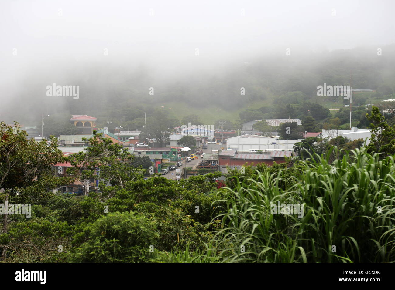 View of Santa Elena town shrouded in mist (Monteverde), Puntarenas ...