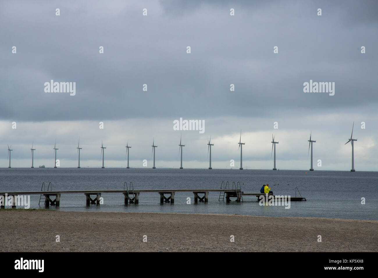 row of windmills at the coast of copenhagen in denmark Stock Photo - Alamy