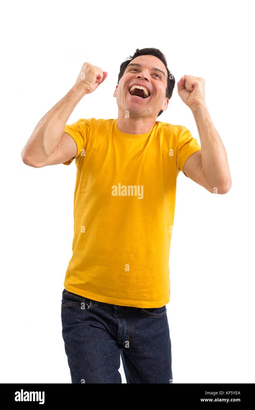 Radiant man is celebrating. Conquest. Victory. He is wearing a yellow ...