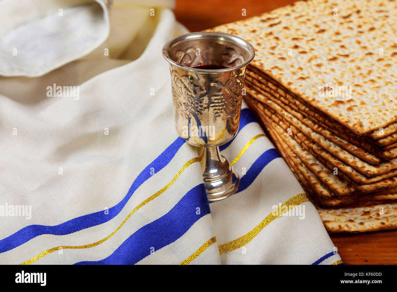 Silver wine cup with matzah, Jewish symbols for the Passover Pesach ...