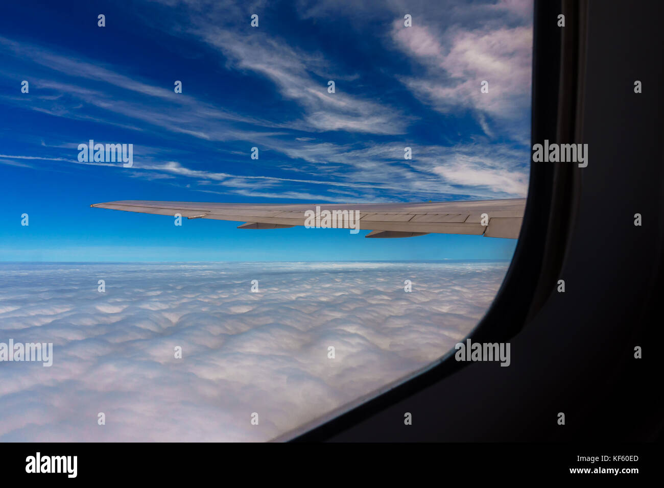 aerial view of blue sky with clouds from window of jet flight Stock ...