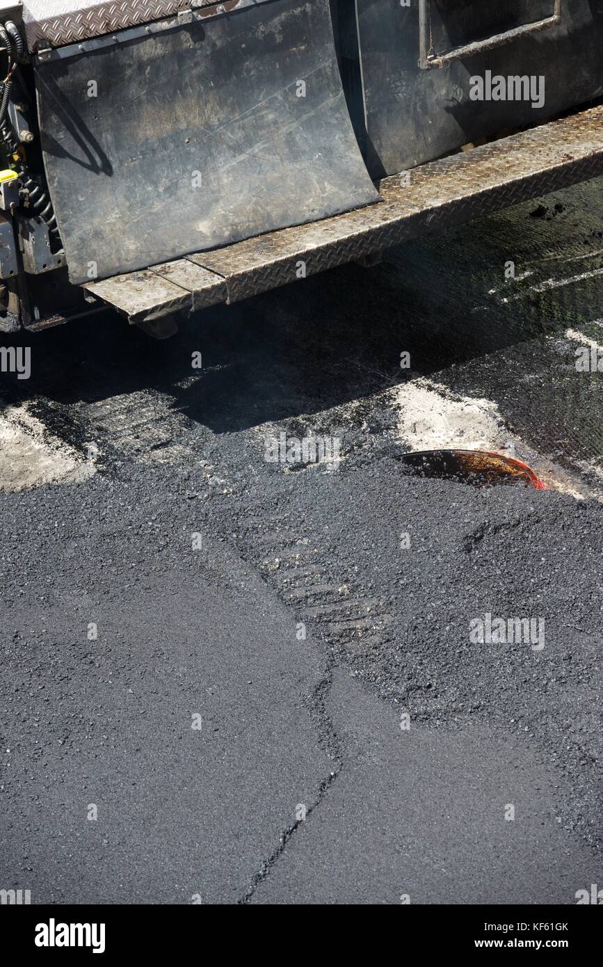 Tracked paver in asphalt pavement works for street repairing Stock ...