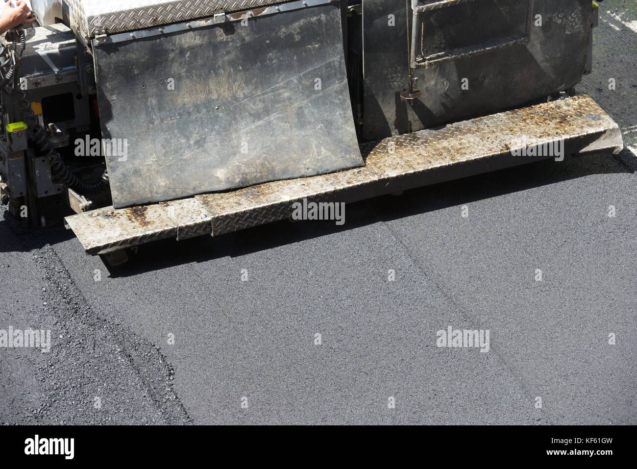 Tracked paver in asphalt pavement works for street repairing Stock ...