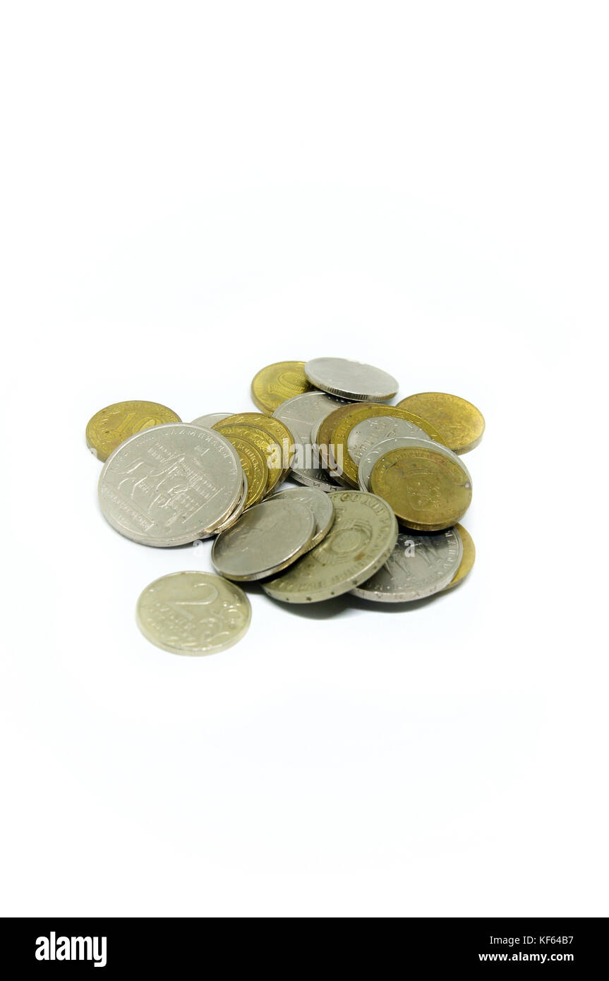 Handful of coins on white background.Isolated Stock Photo - Alamy